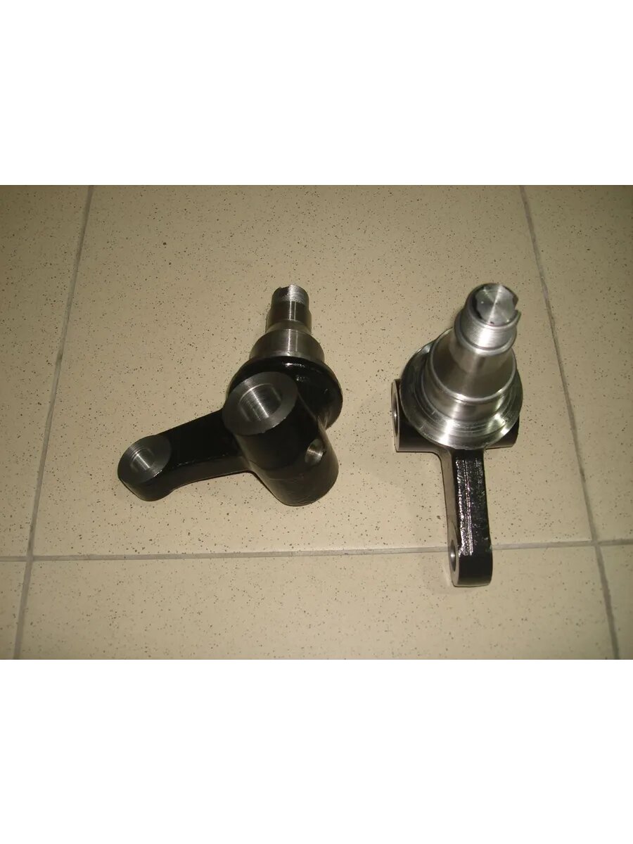 Кулак поворотный Mit. FD20-30N (F18C/ F14E) LH