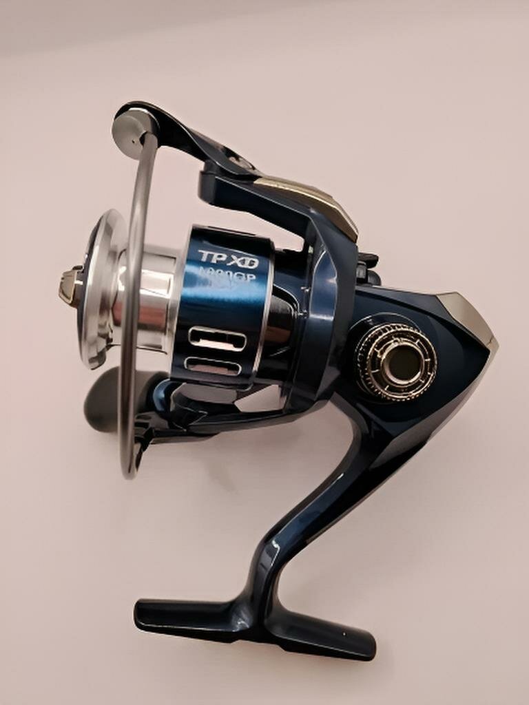 Катушка Shimano Twin Power XD 1000PG надежность, мощность и плавный ход.