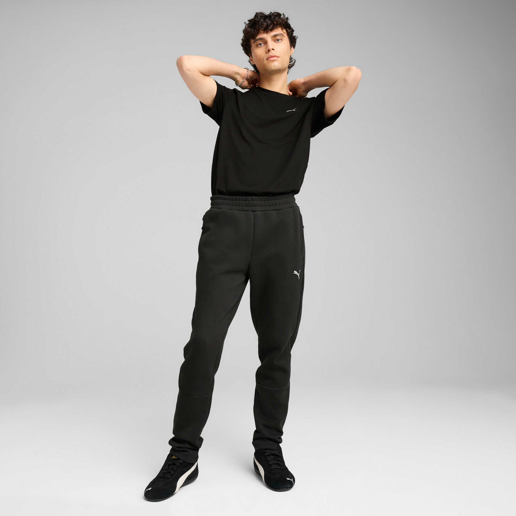 Брюки PUMA EVOSTRIPE Pants, размер M, черный — фото 1