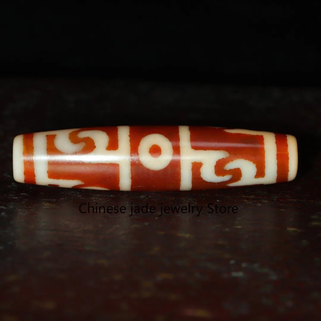 Древние тибетские бусины Дзи из агата с изображением лотоса и тремя глазами