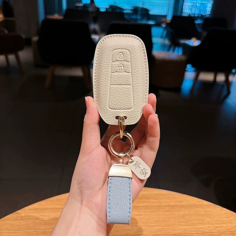 Ключевой брелок Toyota B Style 2-ключевая комплектация с светло-белым, синим коротким креплением и белым миром