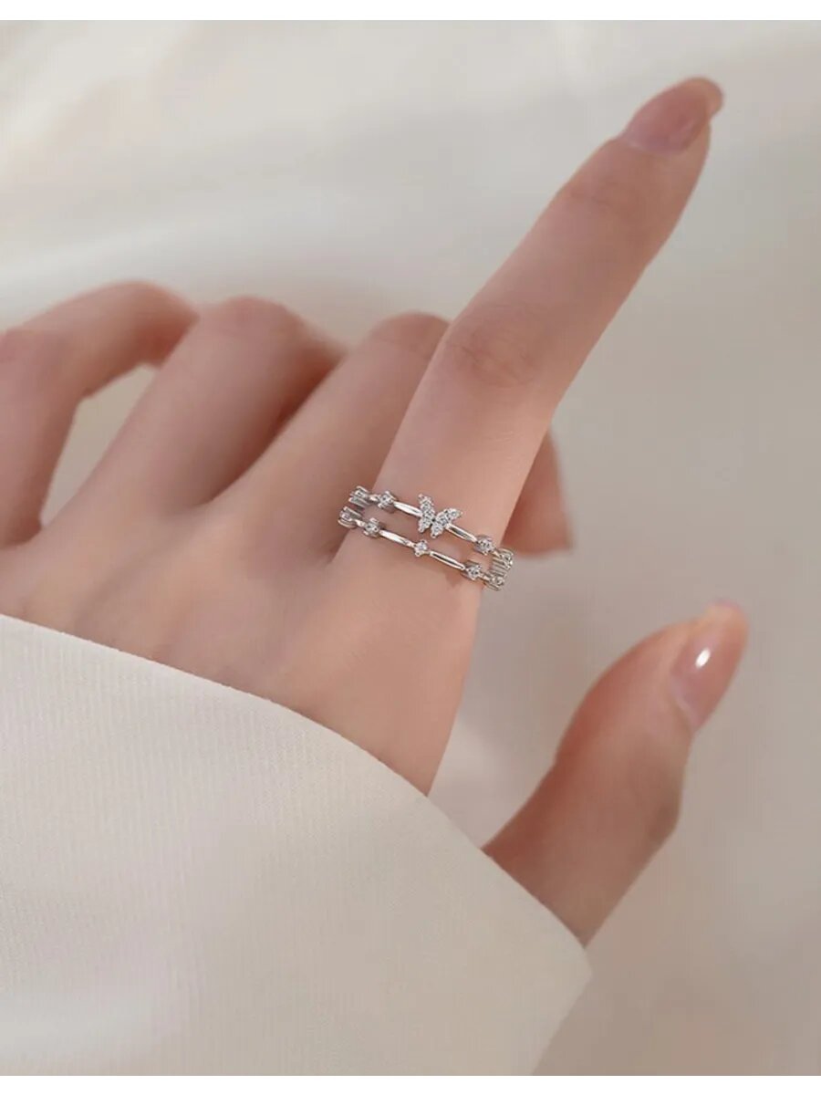 Кольцо переплетенное, циркон