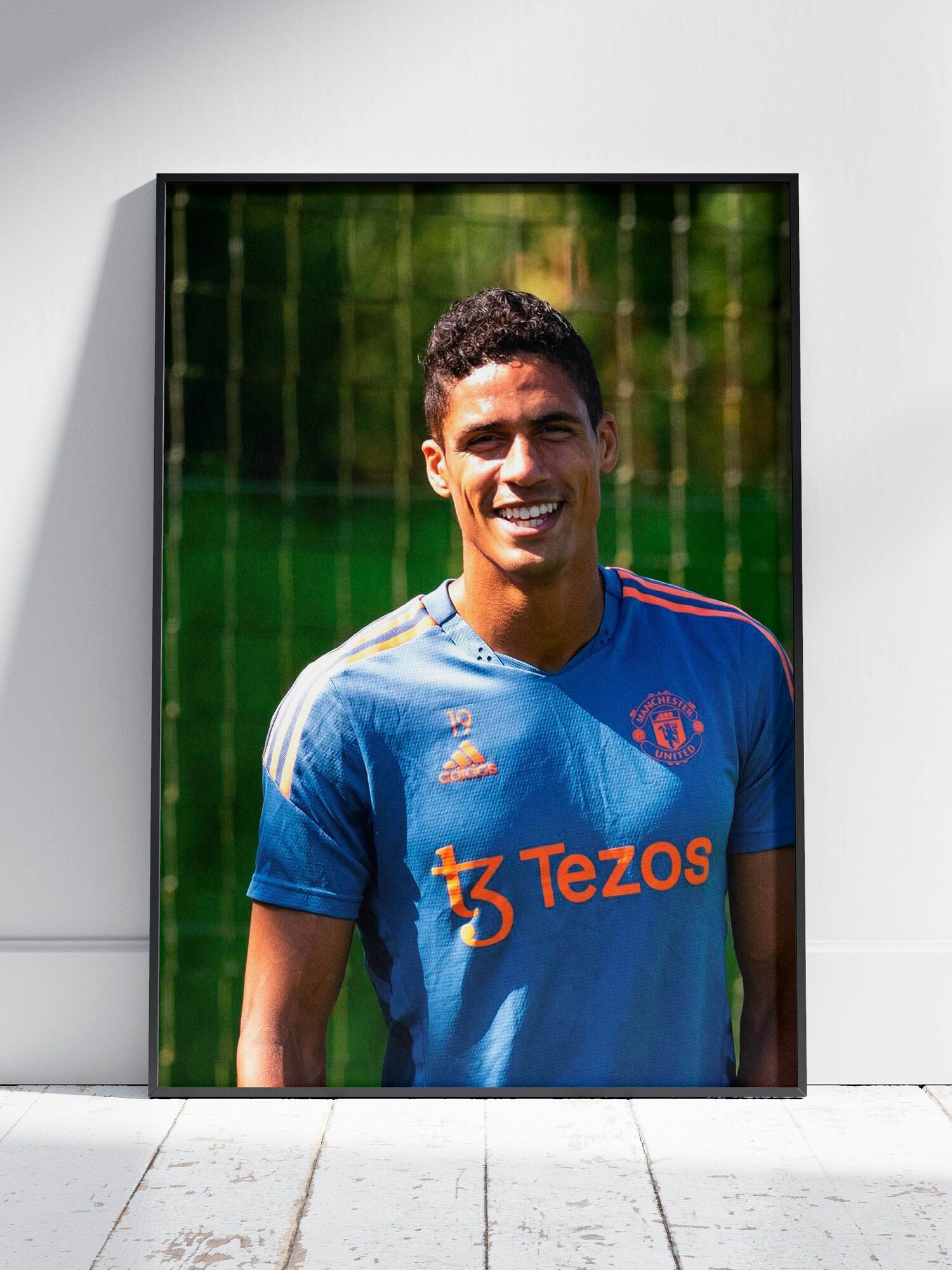 Плакат на стену для интерьера Реал Мадрид (Рафаэль Ксавье Варан - Raphael Varane 1) - Постер по спорту и физической активности формата A4 (21x30 см)