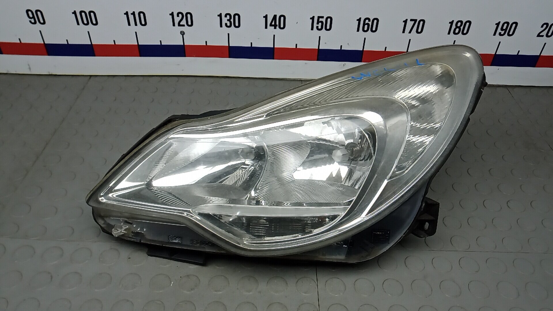 Фара левая OPEL CORSA D