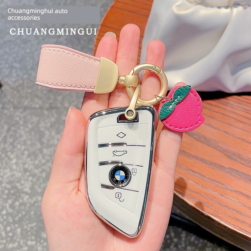 Кейс для ключа BMW TPU прозрачно-белый с розовой пряжкой маленький персик для X3 X4 iX3 5 серия 6 серия 2 серия 325li