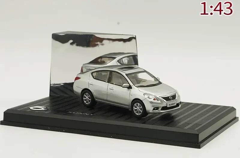 Модель автомобиля Nissan Sunny 1:43 металлическая Nissan Sunny