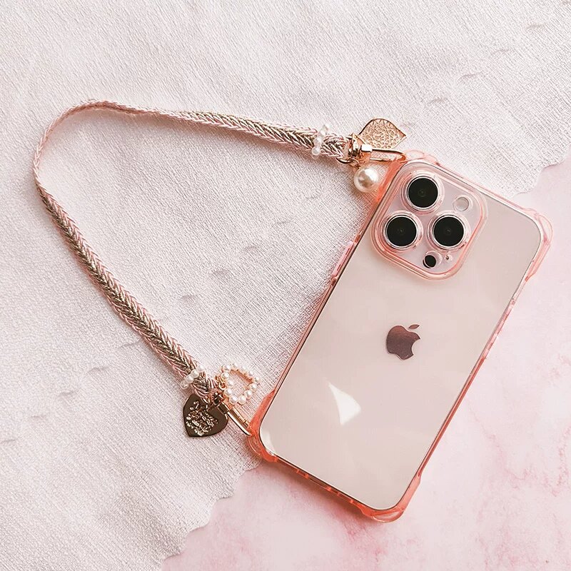 IPhone 14 Plus Крёстная ремешок с четырех-отверстиями, прозрачный розовый чехол и розово-золотой запястье