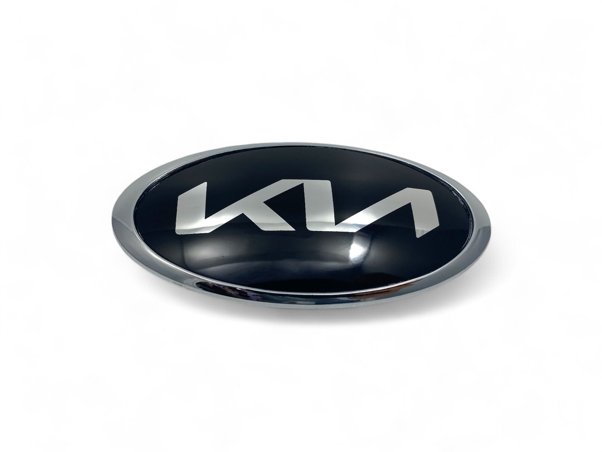 Эмблема Kia, ABS пластик, черная, для нескольких моделей автомобилей, 13x6,5 см — фото 1