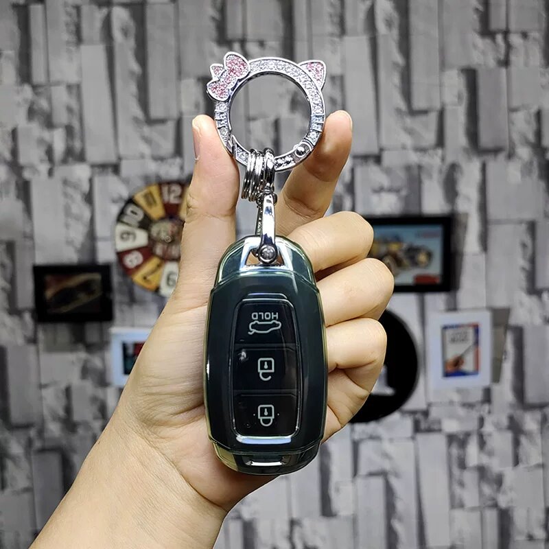 Современный чехол для ключа Hyundai iX35 с зеленой прозрачной оболочкой и браслетом с кошачьим шармом