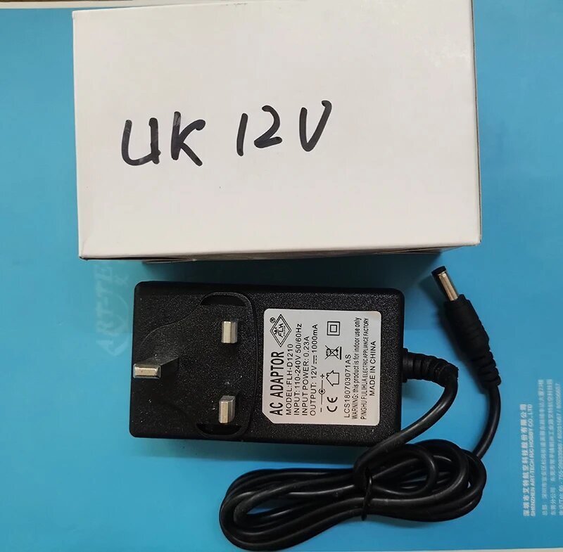 Адаптер питания UK 12V 1000MAH для электромобиля