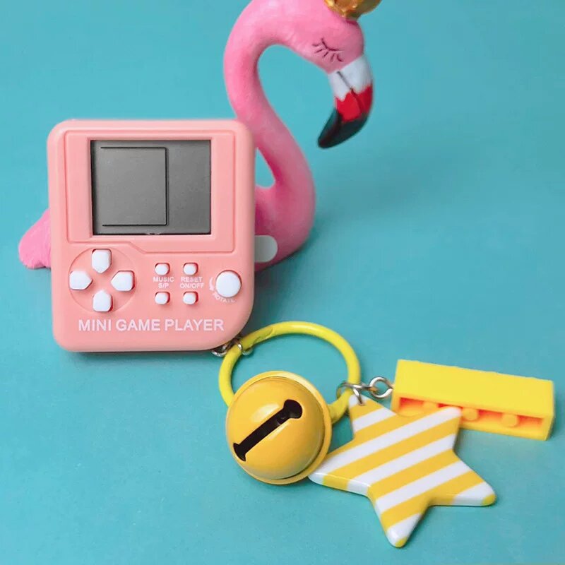 Оранжевая мини-игрушка русской кольцевой игры с блоковым колокольчиком и звездой