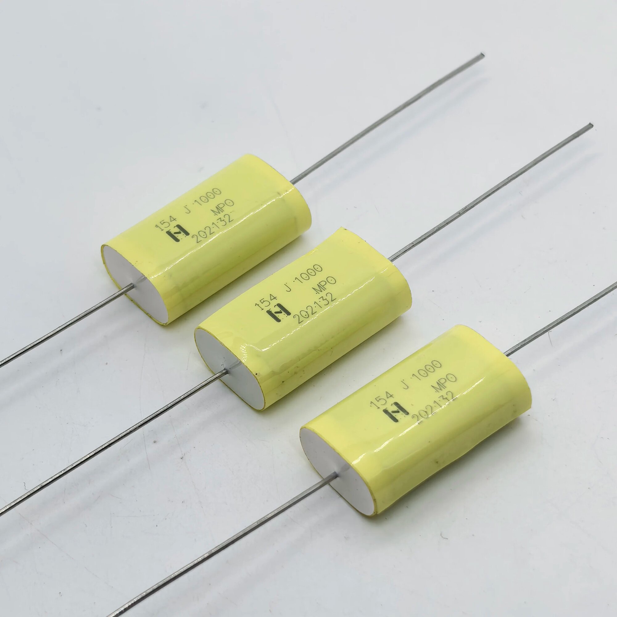 NISSEI 0.15UF 1000V 154 Дж. осевой неполярный защитный пленочный конденсатор IGBT 1шт цена