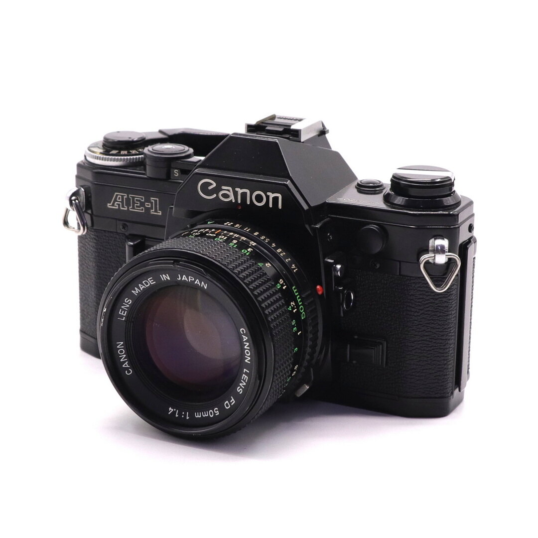 Зеркальный пленочный фотоаппарат Canon AE-1 kit