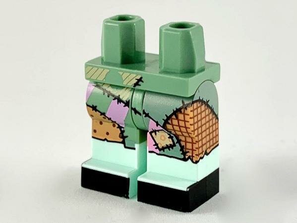 Деталь Lego 970d45pb01 Hips and 1 Nougat Left Leg, 1 Sand Green Right Leg with Light Aqua Boots, Multicolor Ragdoll Patchwork, Black Toes Pattern