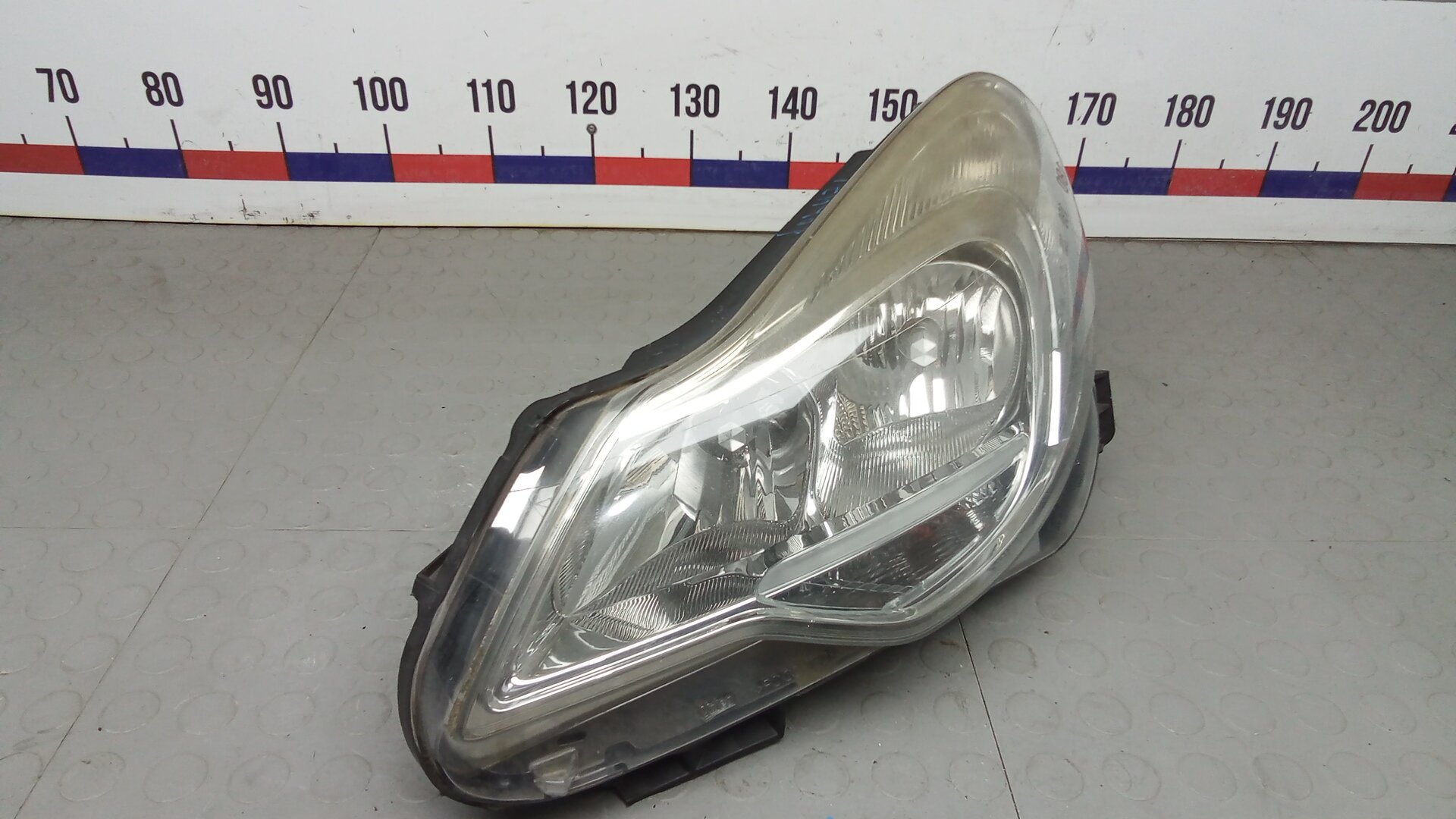 Фара левая OPEL CORSA D