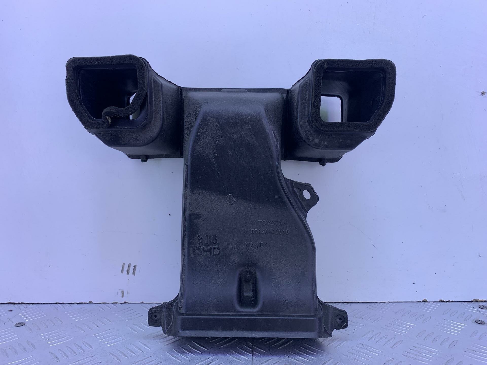 Воздуховод печки Toyota Yaris 2 XP90 (2005 - 2009) 558400D010