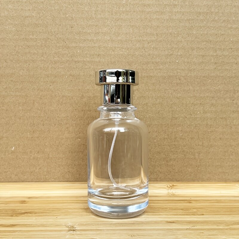 Прозрачный стеклянный пустой флакон для духов 50 мл (1.69 fl oz) с серебристой крышкой