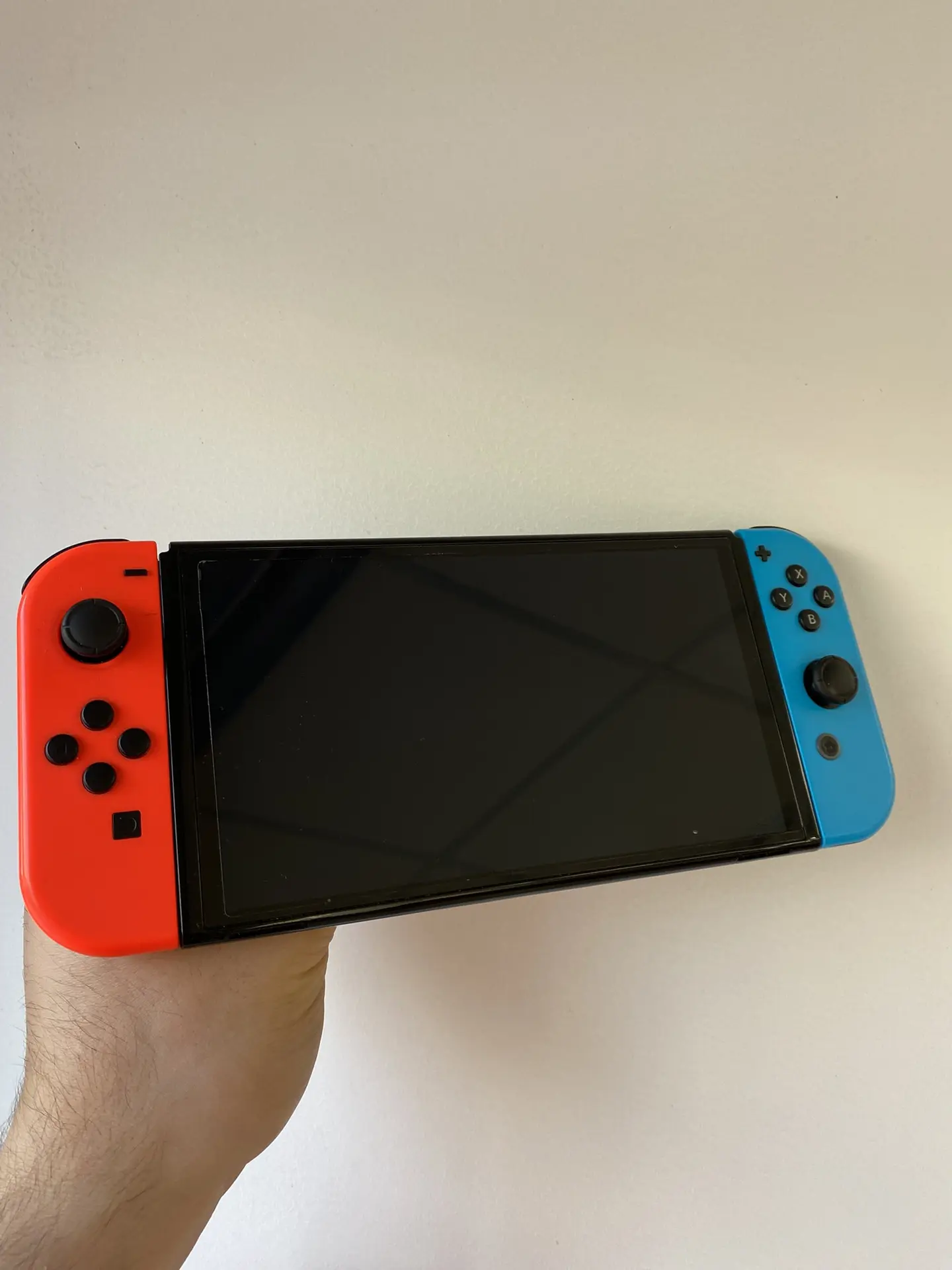 Игровая консоль Nintendo Switch OLED 64 Gb сине-красная — фото 1