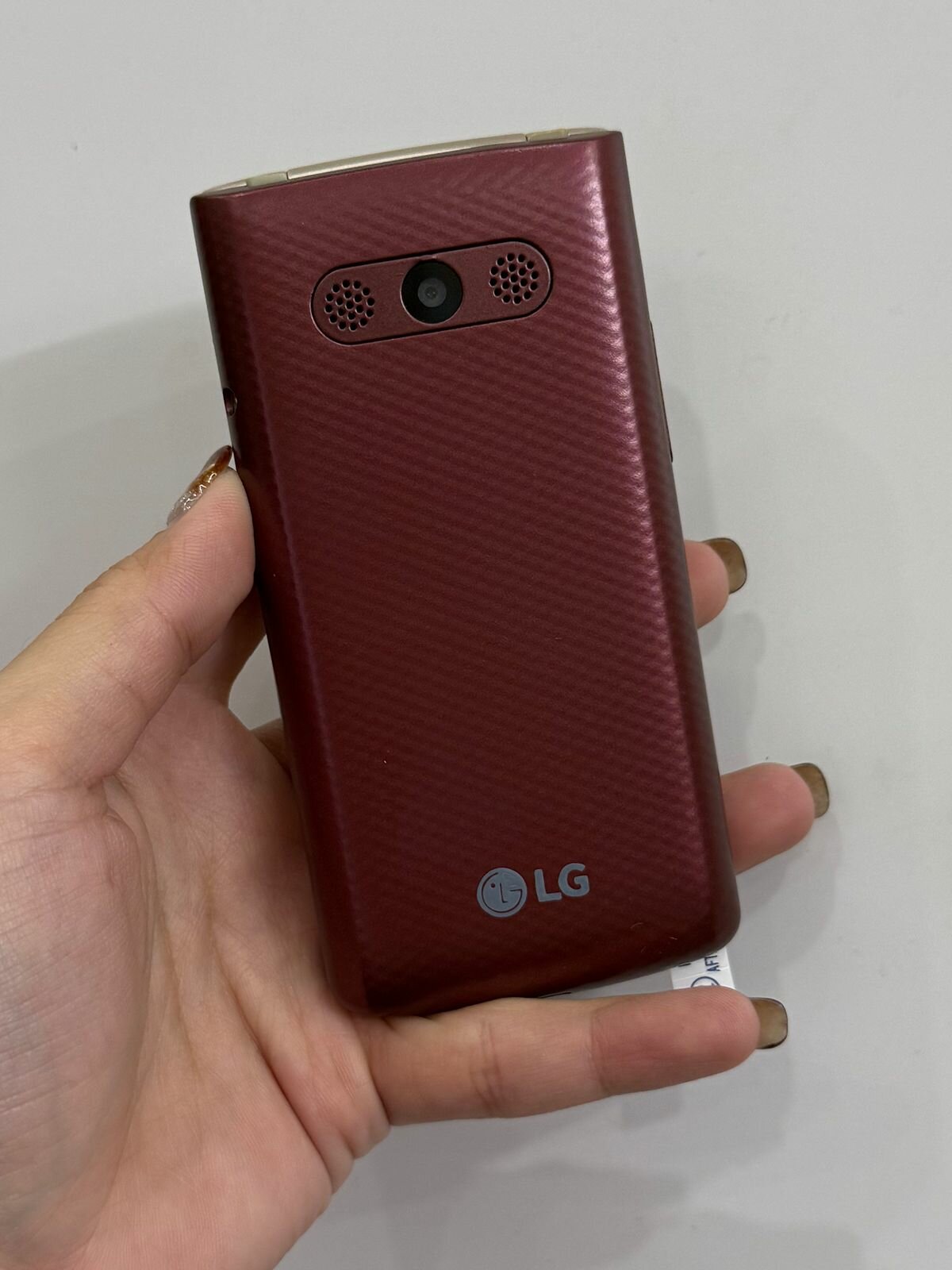 LG Мобильный телефон X100, бордовый