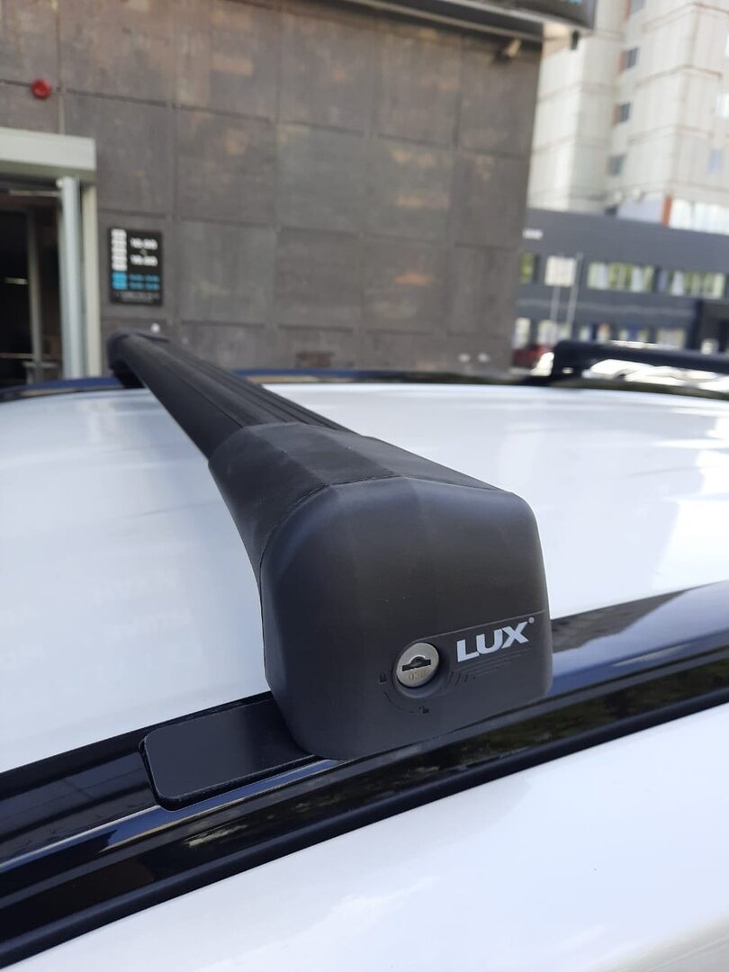Багажник на крышу Lux Bridge для Toyota Rav4 2019 г. в. - по н. в. с черными крыловидными дугами/Багажник на крышу Люкс Бридж для Тойота Рав4