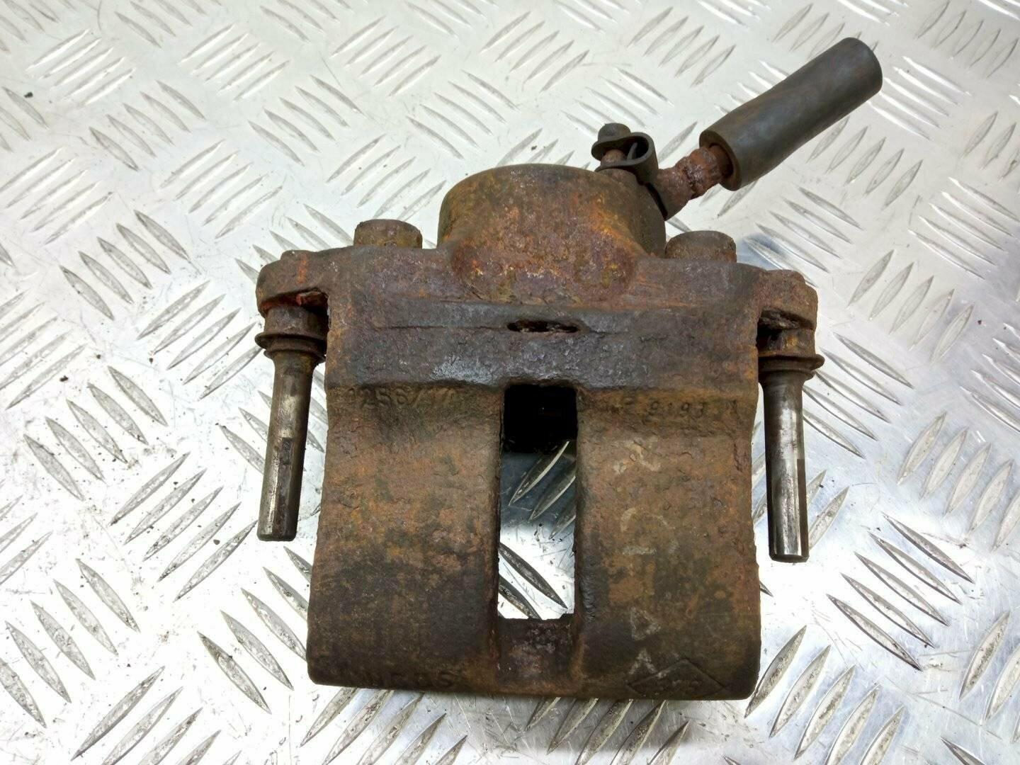 Суппорт тормозной передний левый Renault Sandero 2009