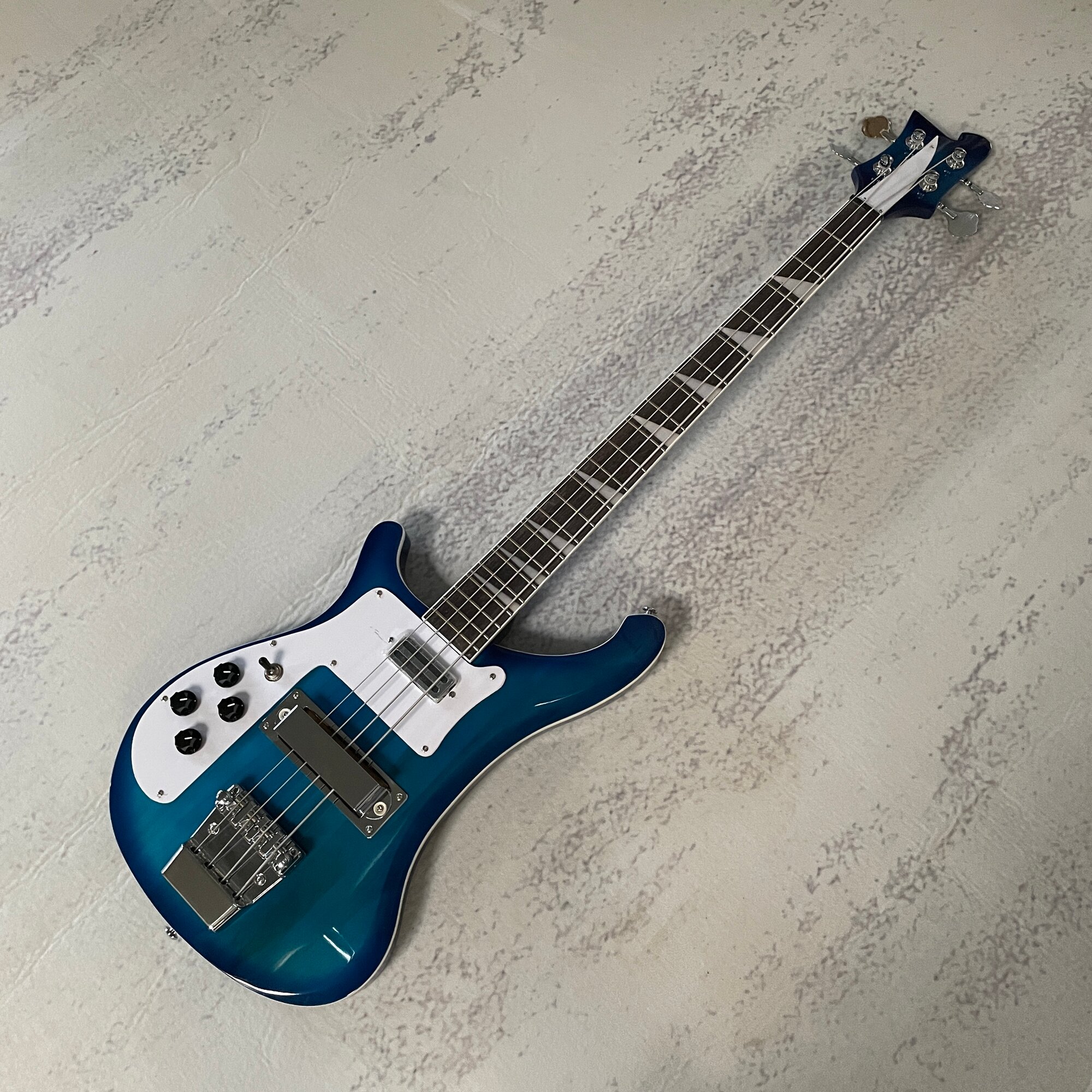 Электрогитара Rickenbacker "4003", стиль бас, левша, сине-белая, градиент, треугольники, подкова, стерео