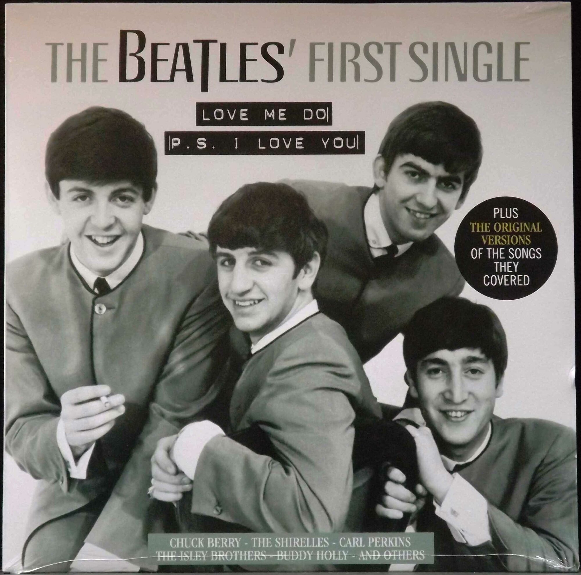 Beatles "Виниловая пластинка Beatles First Single"