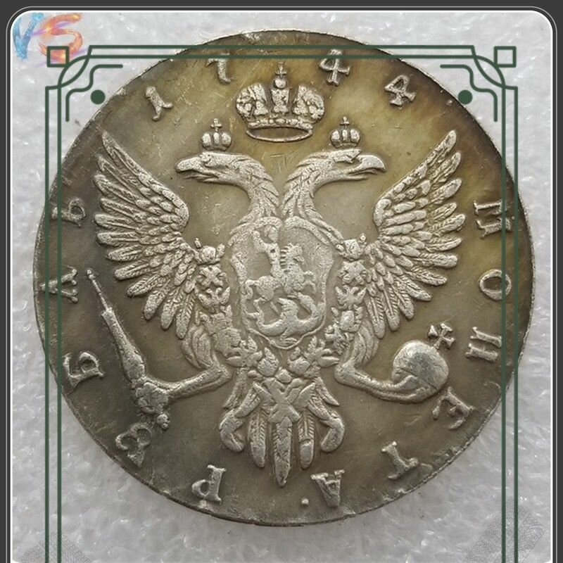 Это монета периода царской России, отчеканенная в 1744 году.