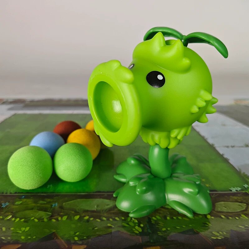 Игрушка-оригинальный стрелок-горошек из серии «Растения против зомби» со светящимся эффектом и шестью губчатыми