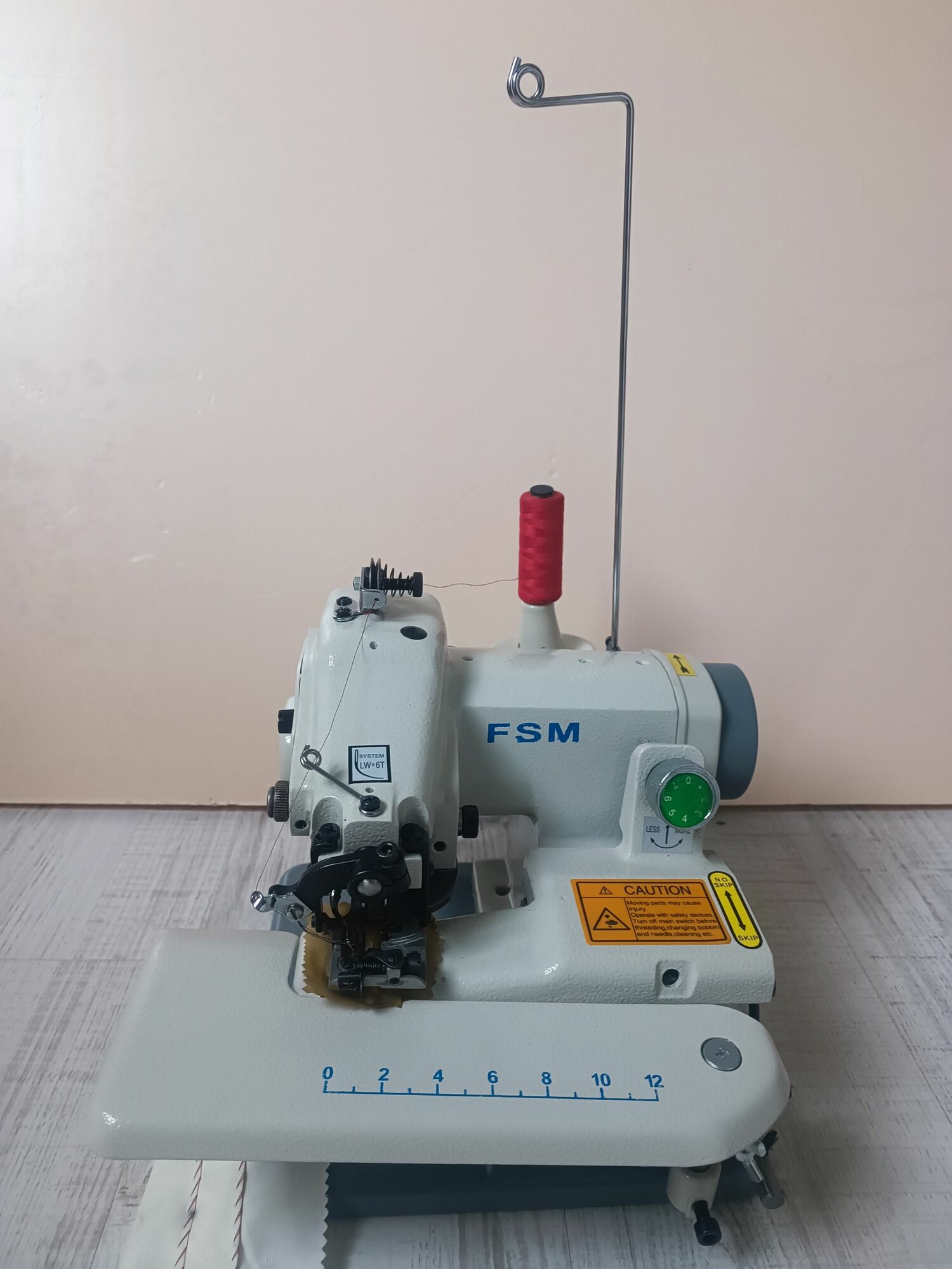 Подшивочная швейная машина FSM SM-T500 с функцией "Захват через стежок"