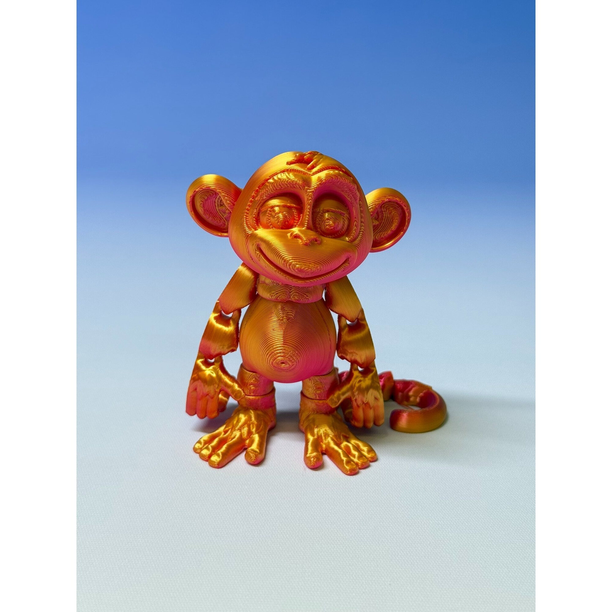 Фигурка обезьяны длиннохвостой 3D пластик красный золотой