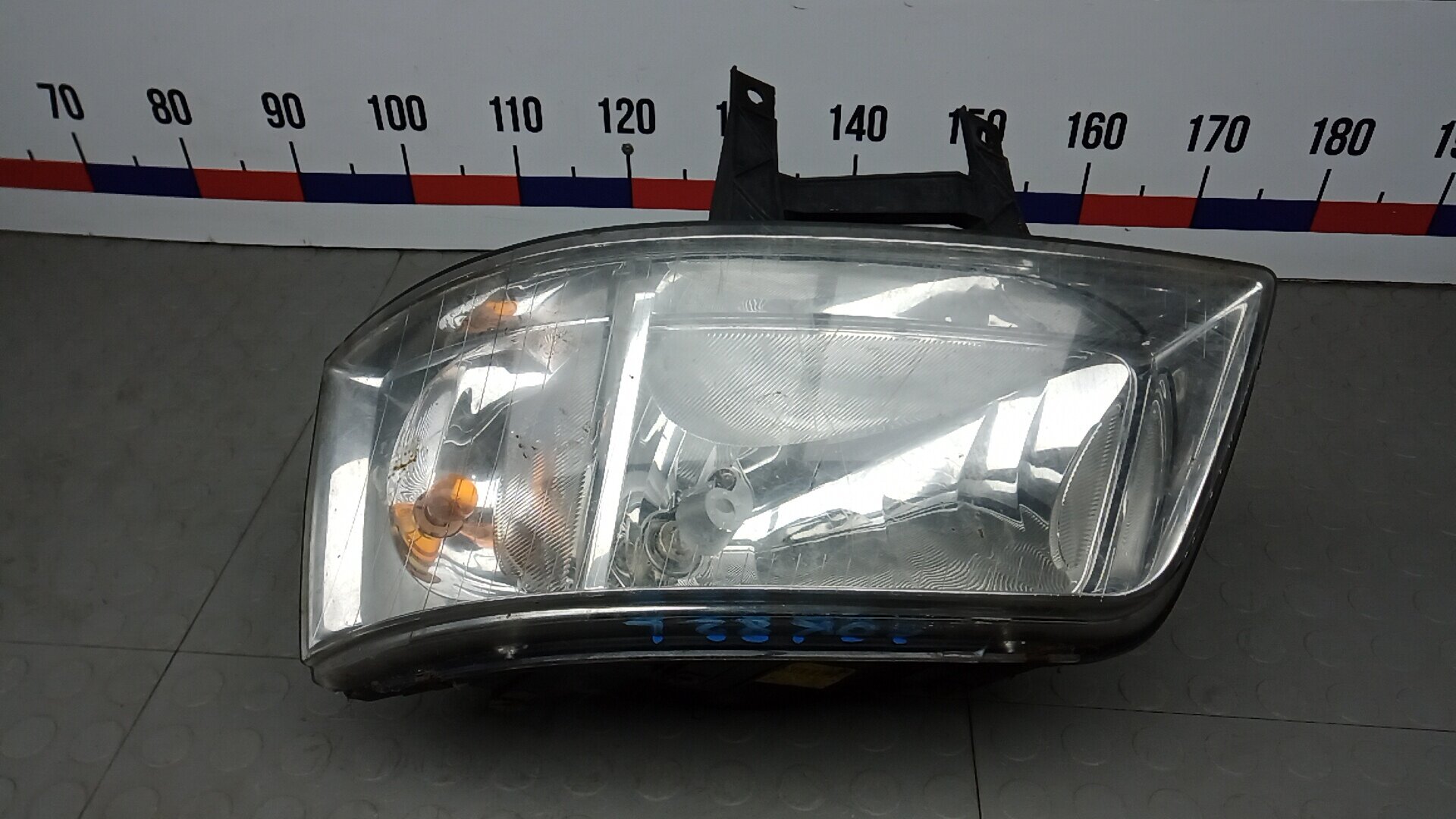 Фара левая VOLKSWAGEN TRANSPORTER T5