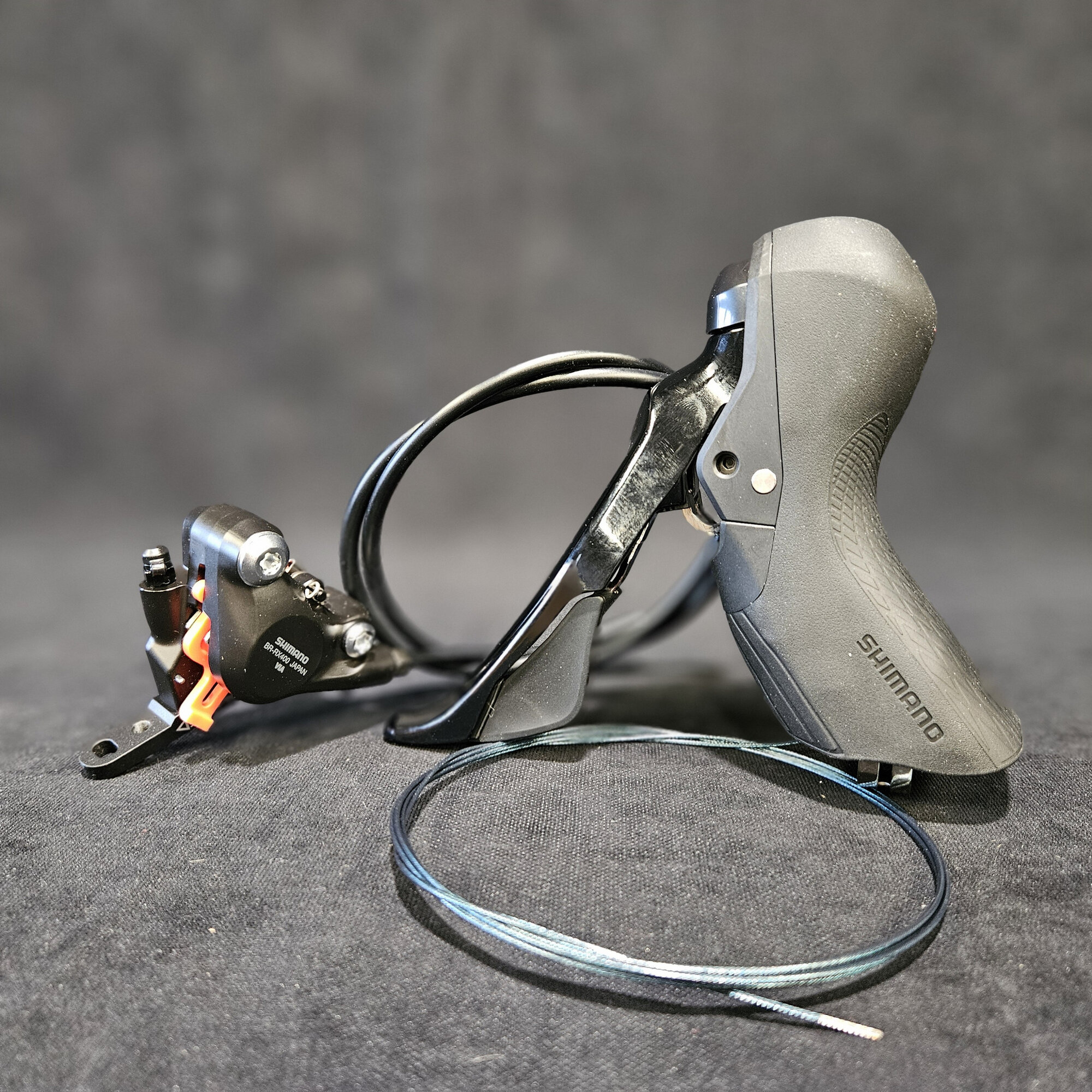 Пистолет-манетка Shimano GRX ST-RX400 (гидравлика), 2 ск, калипер GRX BR-RX400 (колодки - K05S), гидролиния 800 мм, J-kit (OEM без упаковки)