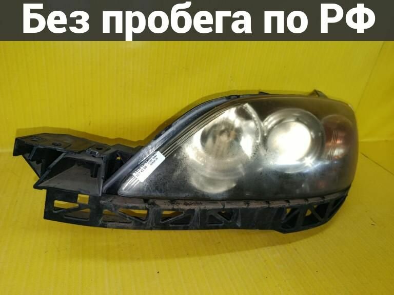 Фара Лево с пробегом Mazda Axela BK5P