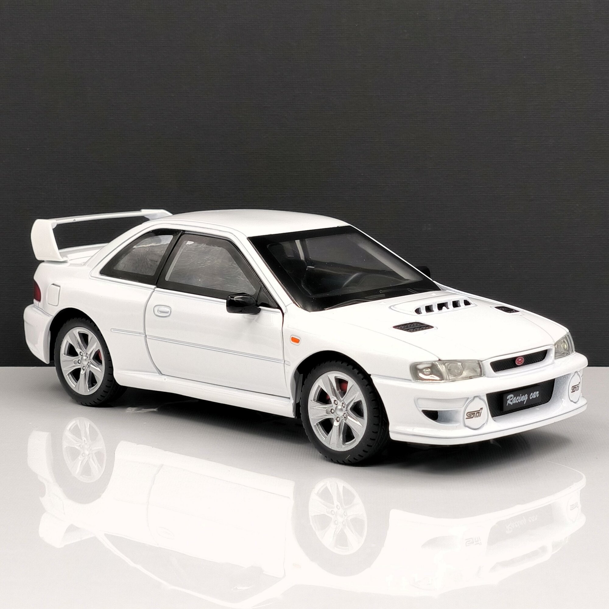 Subaru Impreza WRX STI Инерционная металлическая модель автомобиля с световым и звуковым сопровождением. Масштаб 1:24