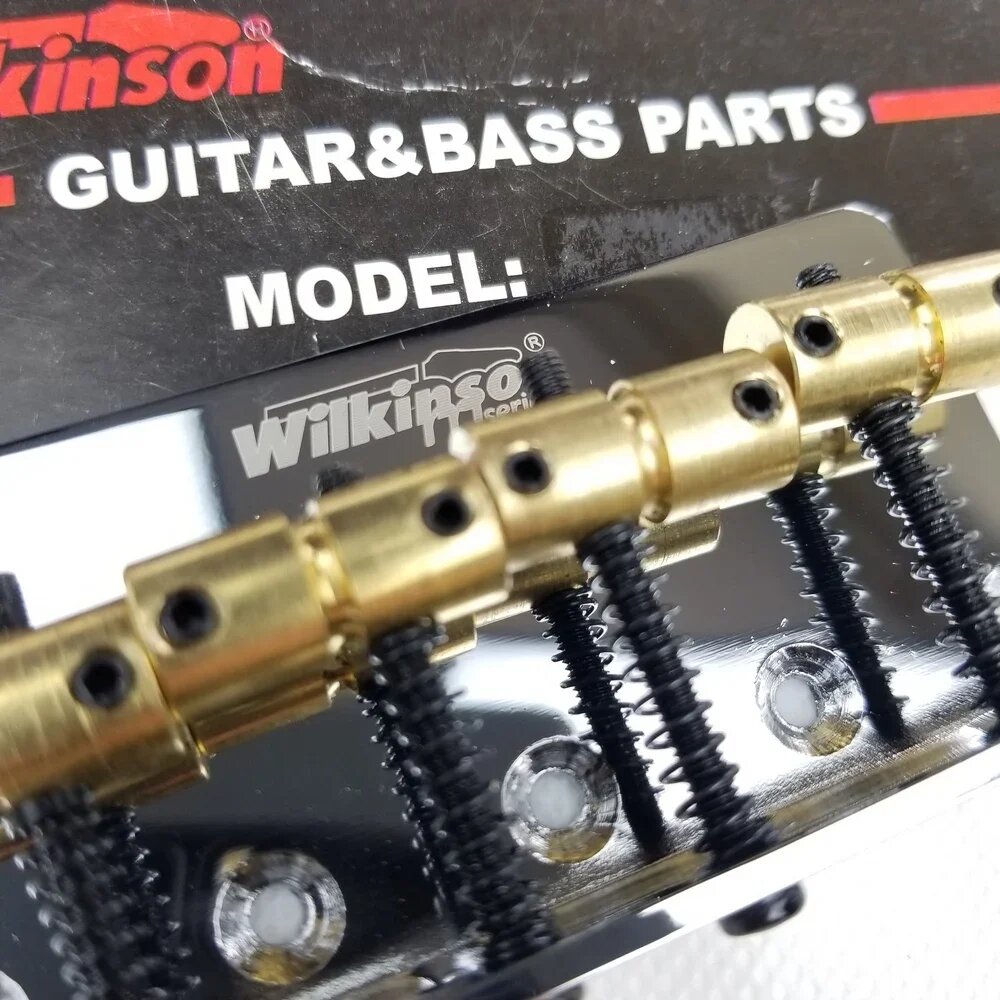 Wilkinson четыре 4-струнный электрический бас-бридж с латунными седлами для прецизионных джазовых басов, хромированный, серебристый WOB41 — фото 1