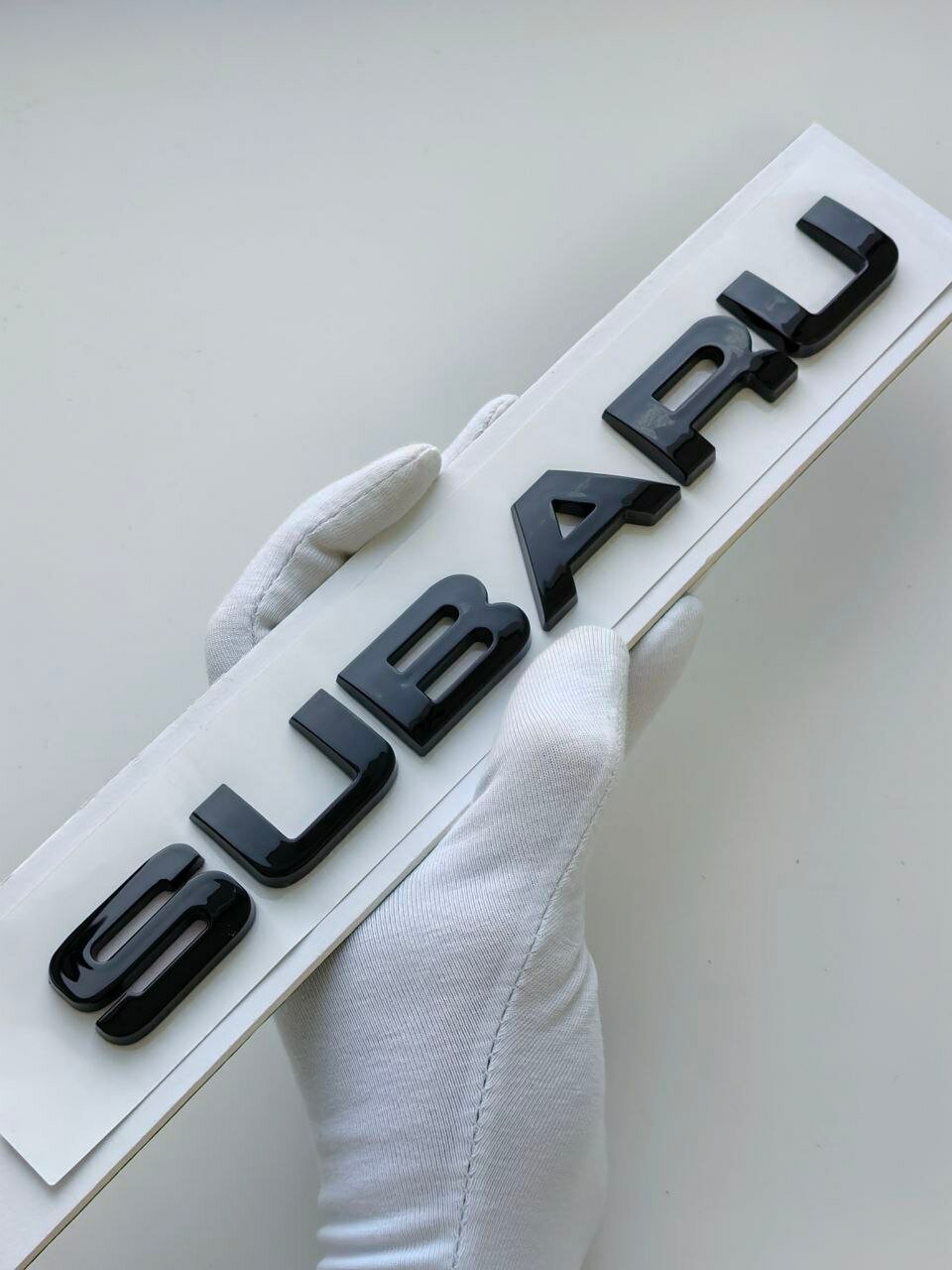 Надпись Subaru чёрный глянец 215/22мм. , шильдик Субару 1 шт.