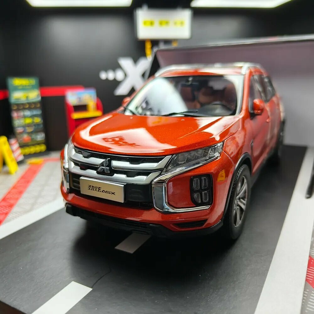 Модель автомобиля Mitsubishi ASX 1: 18 из металлических сплавов, оранжевый