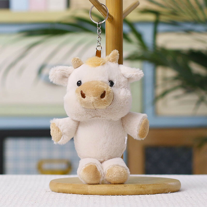 Cute animal plush toy with short plush material for bag decoration and collectors ivory small bull