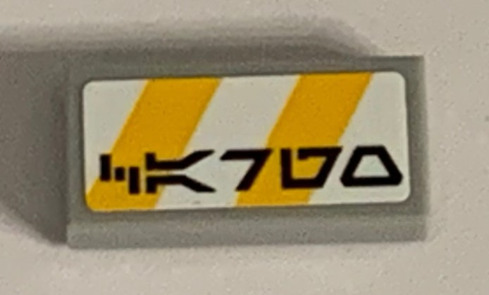 Tile 1 x 2 with Bright Light Orange and White Danger Stripes and Aurebesh Characters 'CARGO' Pattern (Sticker) - Set 75212, 3069pb0798 Light Bluish Gray U