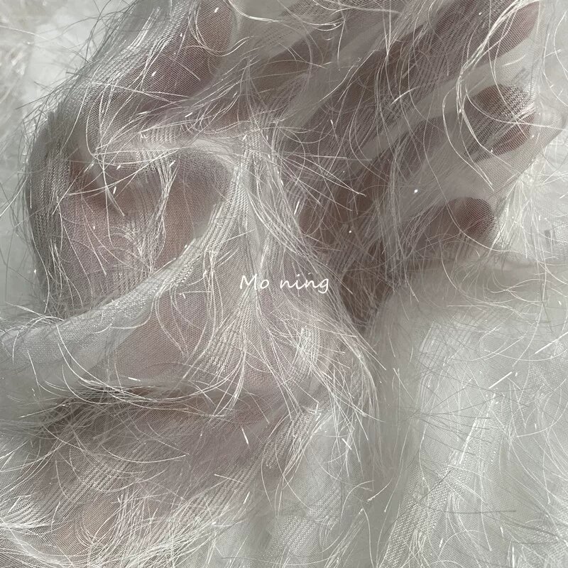 Материал для детской одежды: легкий, полупрозрачный шифон с мерцающими диагональными полосами и блестящими кисточками,