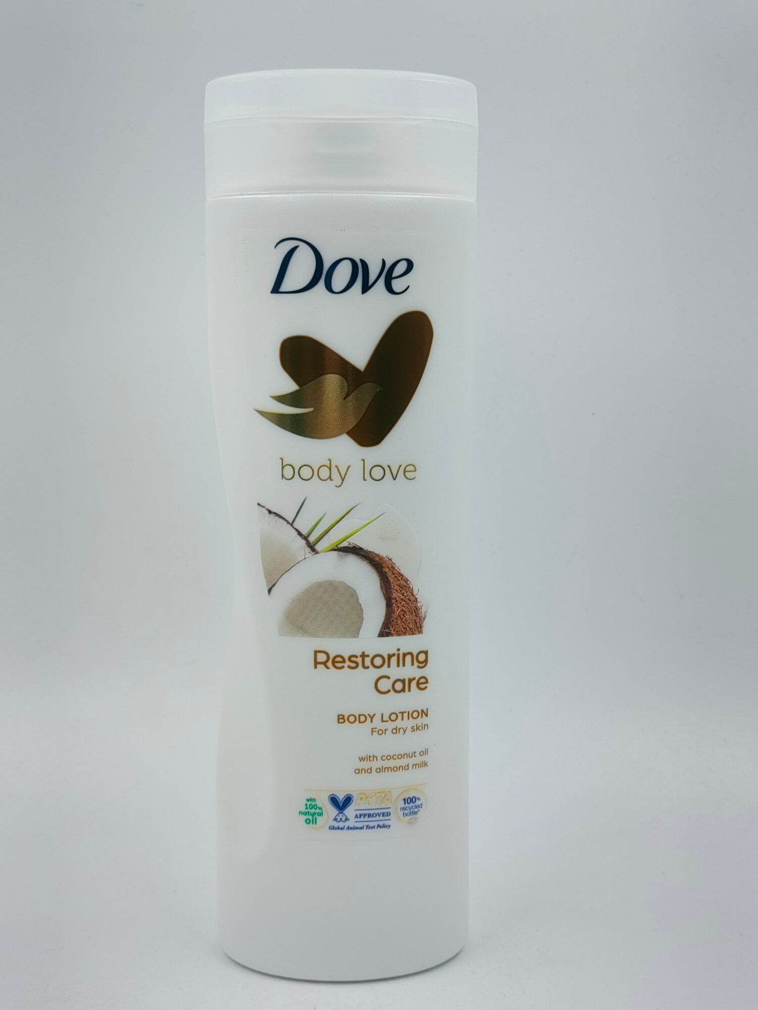 Лосьон для тела для сухой кожи DOVE Restoring Care с маслом кокоса и миндаля, 250 мл