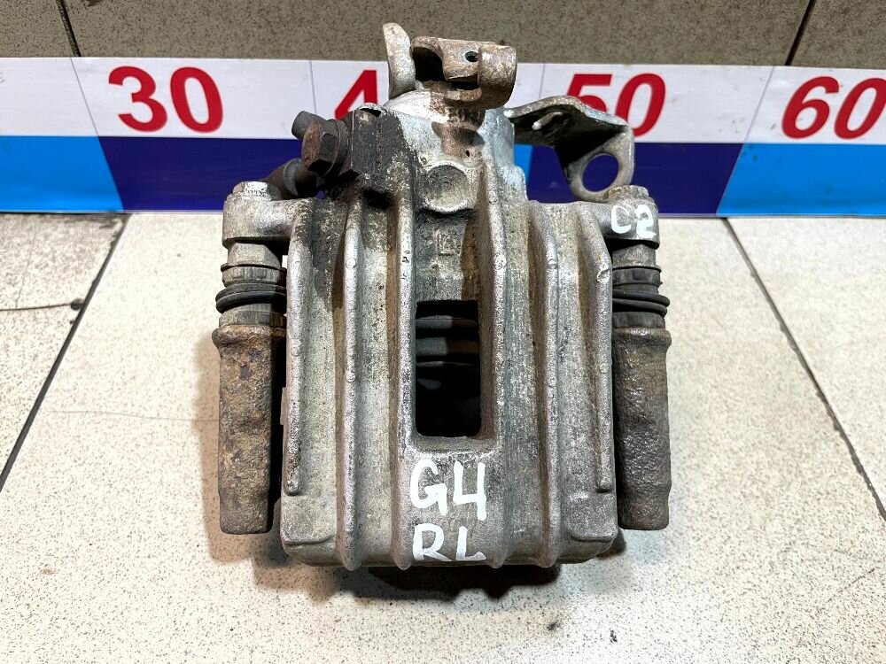 Суппорт задний левый VW Golf IV