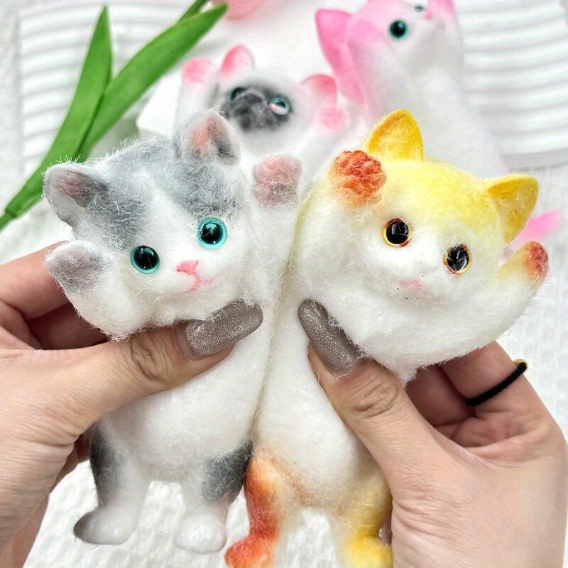 Мягкая пушистая игрушка-котёнок розового цвета