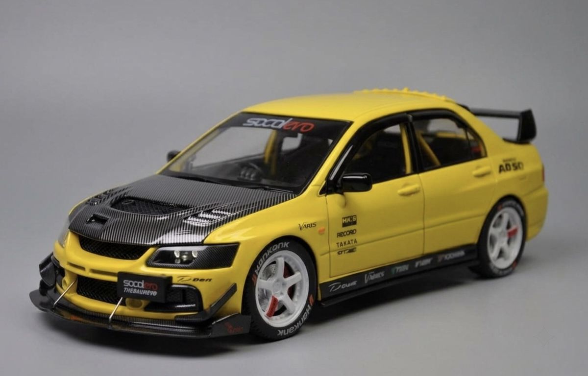 Машинка металлическая инерционная модель Mitsubishi Lancer Evolution IX - Dirt Rally 2005-2007 (Мицубиси Лансер Эволюшн желтый 21 см) Ралли Детская игрушка / Масштаб 1:23