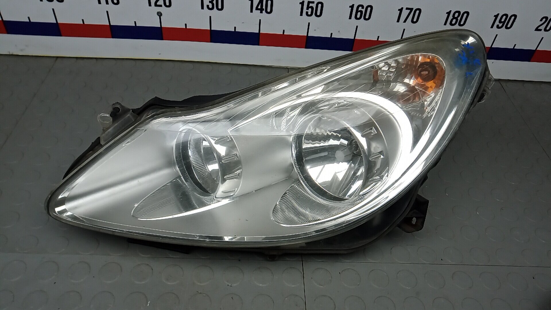 Фара левая OPEL CORSA D