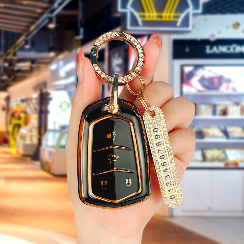 Премиум чехол для ключа Cadillac для моделей XT5, XT4, CT5, CT6, ATS-L, XT6, SRX, CT4 - черный с золотым шармом,
