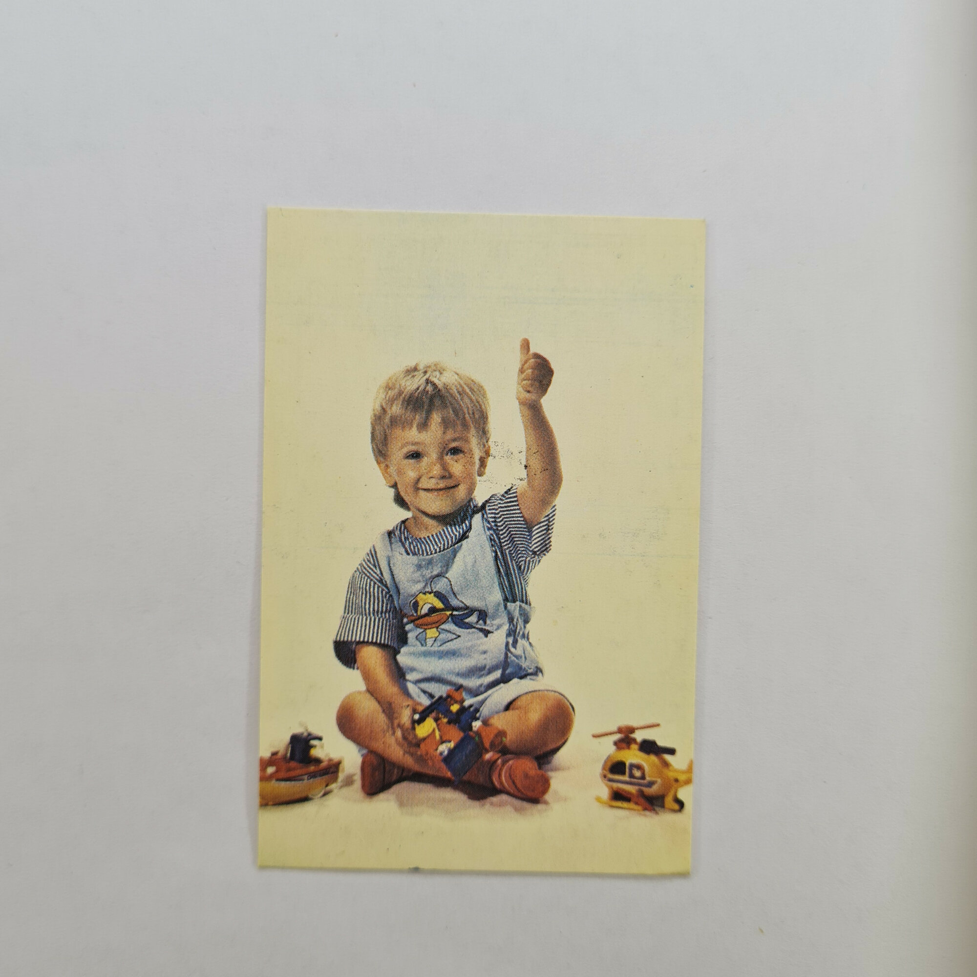 Карманный календарик СССР 1991. Страхование детей, ребенок с игрушками. Советский календарь