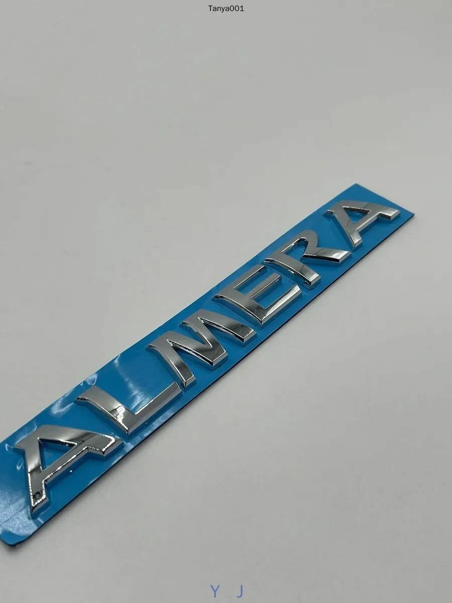 Шильдик Наклейка на багажник Almera Хром