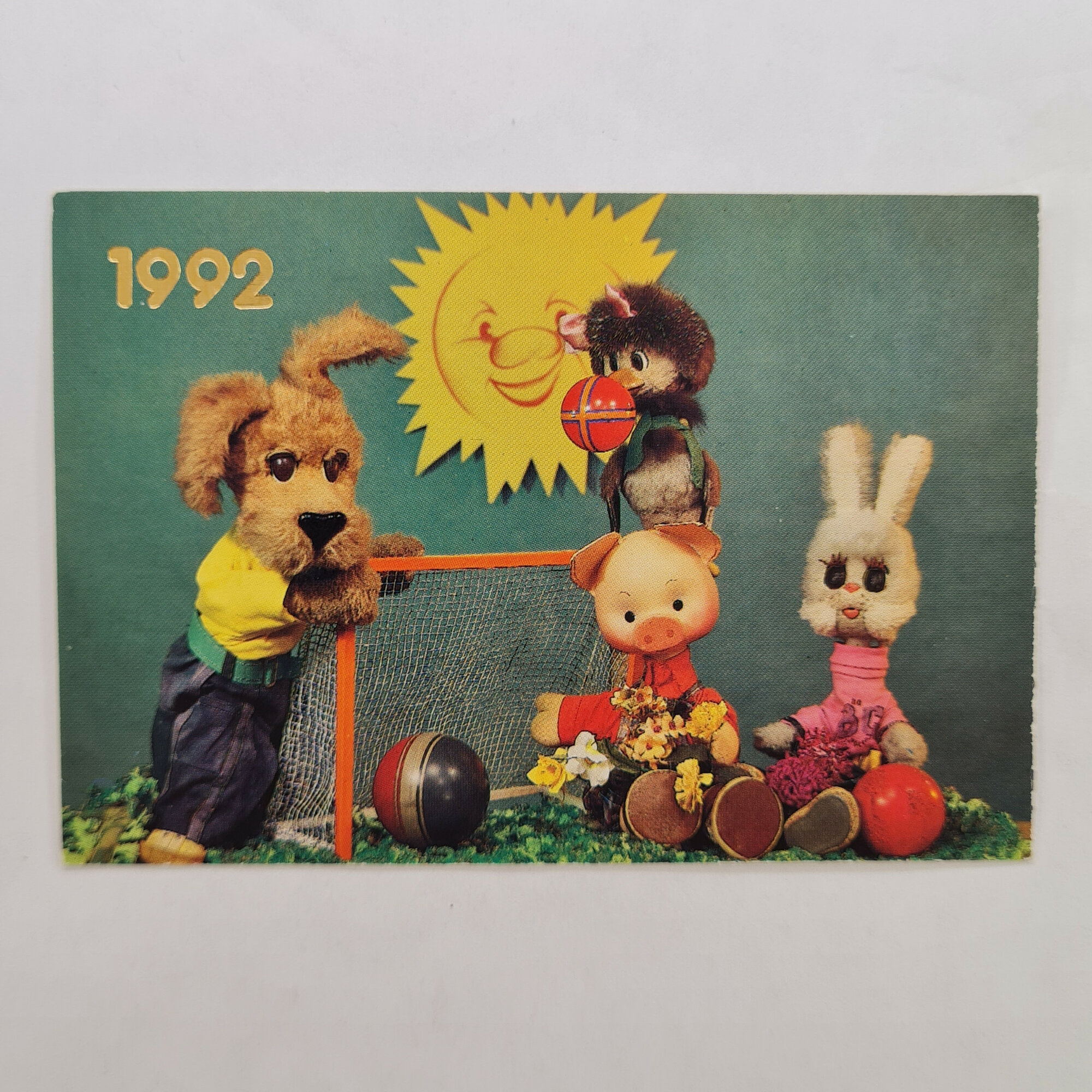 Карманный календарик 1992. Игрушки, зверята у сетки и мячей, детская тема. Календарь винтажный